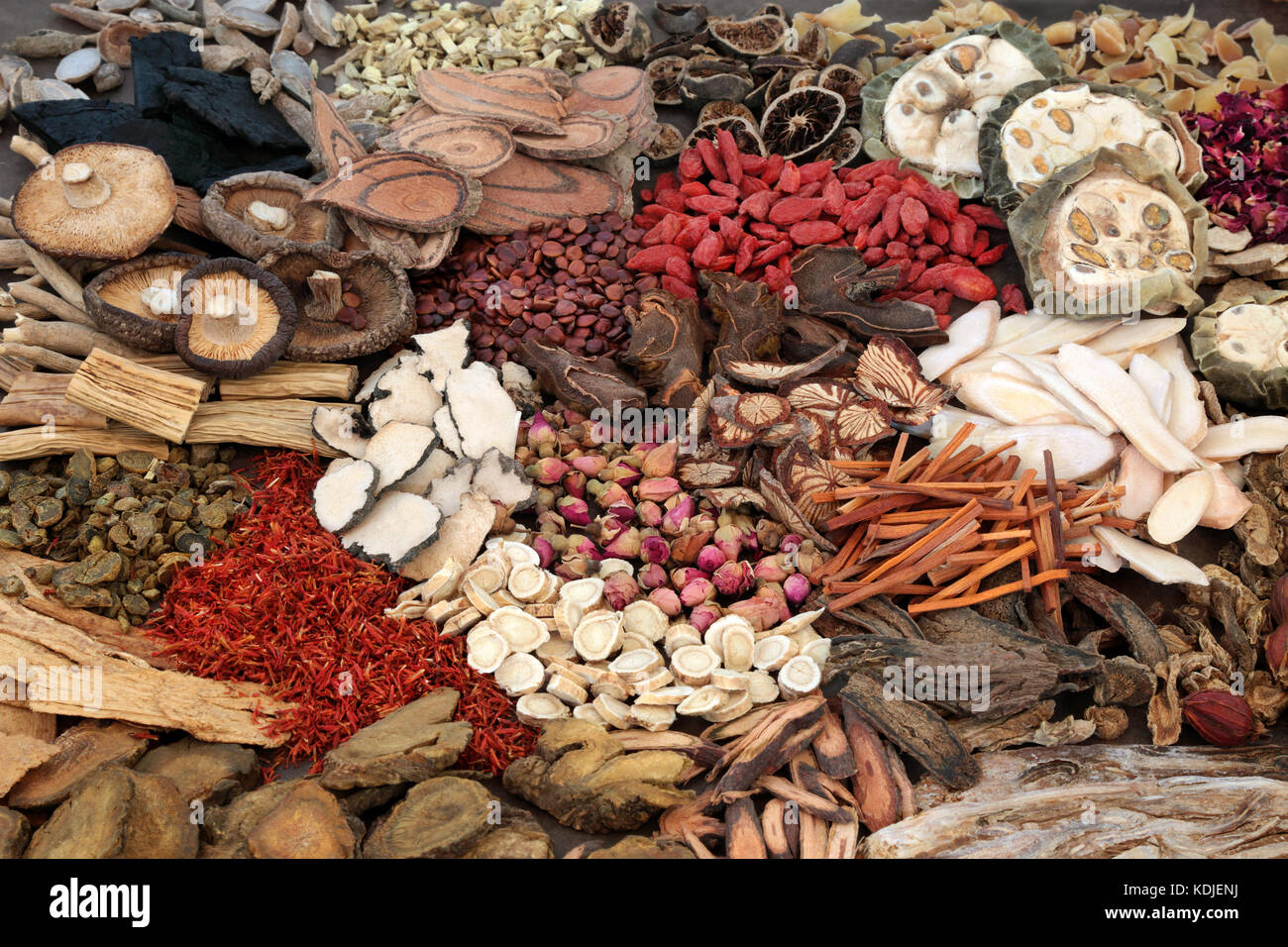 Traditional chinese herbs used in herbal medicine forming a background ...