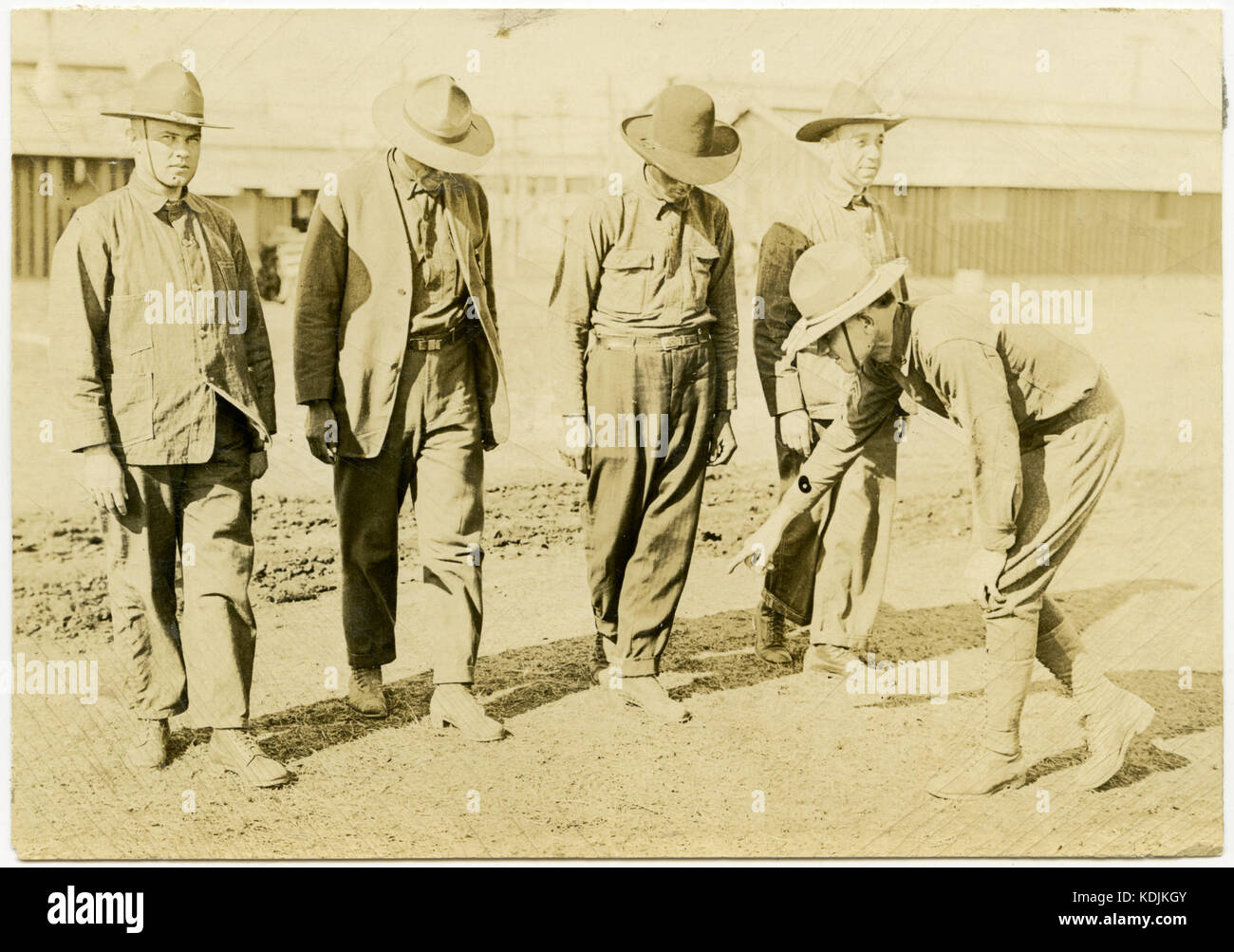 Soldiers Standing in Line While Another Soldier Stands in Front ...
