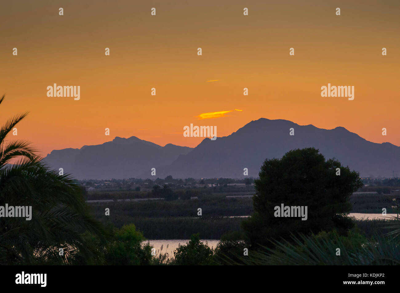 Sunset over the Pila mountains, Spain Stock Photo - Alamy