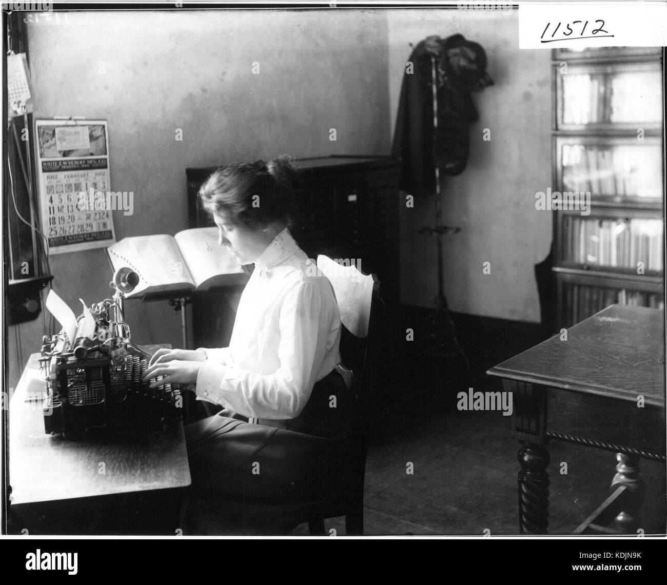 Secretary at typewriter 1912 (3190622351 Stock Photo - Alamy