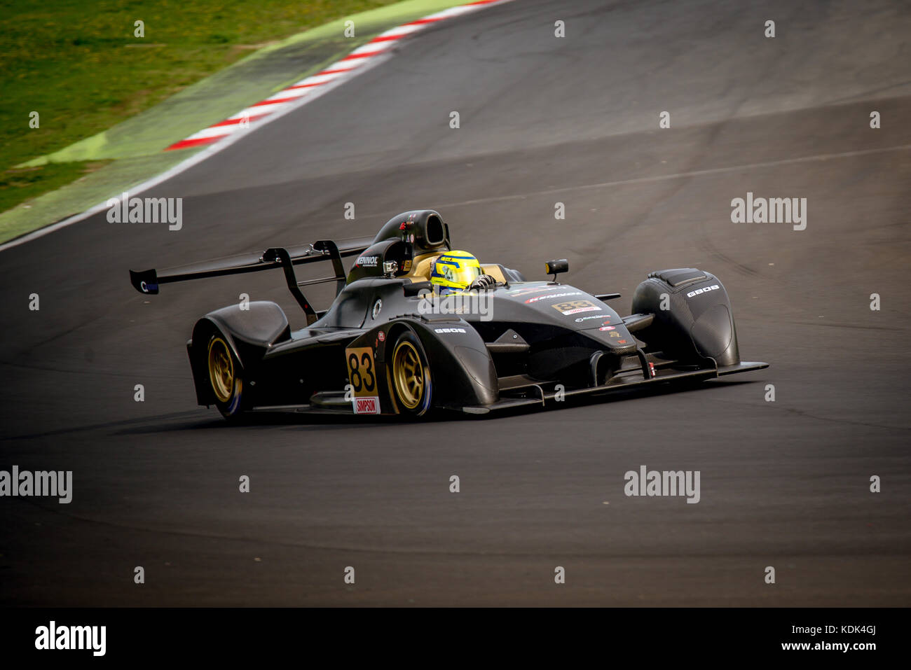 Prototype car in action at turn during the race Stock Photo - Alamy