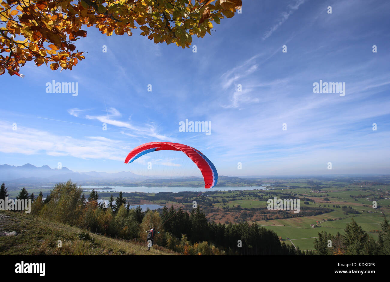 Buching, Schwangau, Germany. 13th Oct, 2017. A paraglider takes off ...