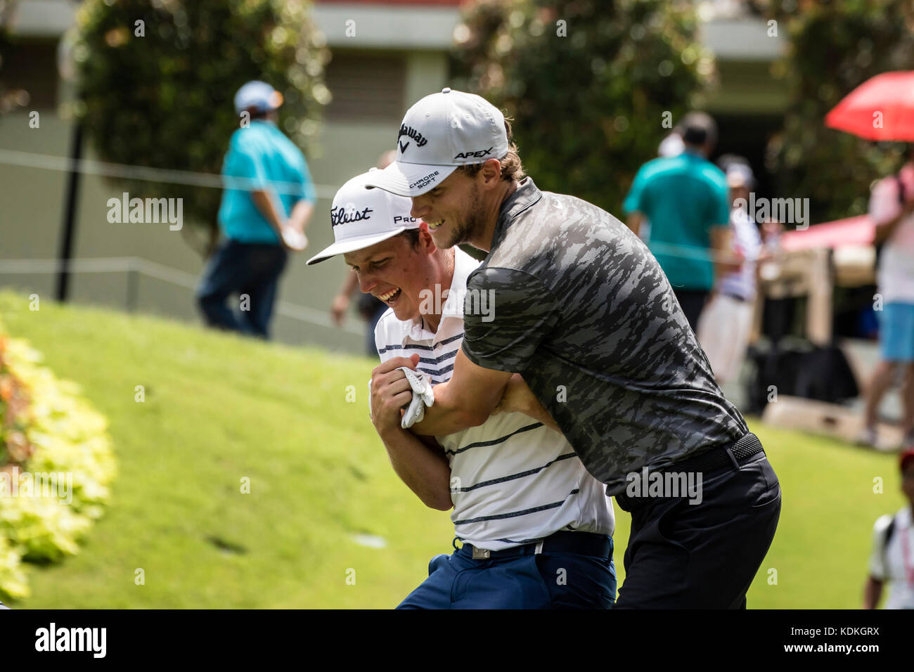 Kuala Lumpur, Malaysia. 14th October, 2017. Golfers Cameron Smith and Thomas Pieters joking ...