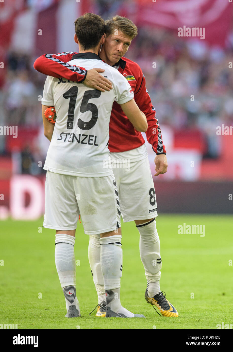 Munich, Germany. 14th Oct, 2017. Freiburg's Pascal Stenzel (L) und Mike ...
