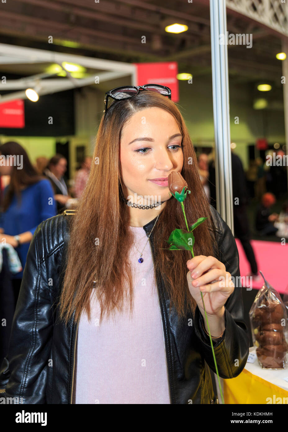 London, UK, 14th Oct 2017. A visitor smells a the aroma of a chocolate ...