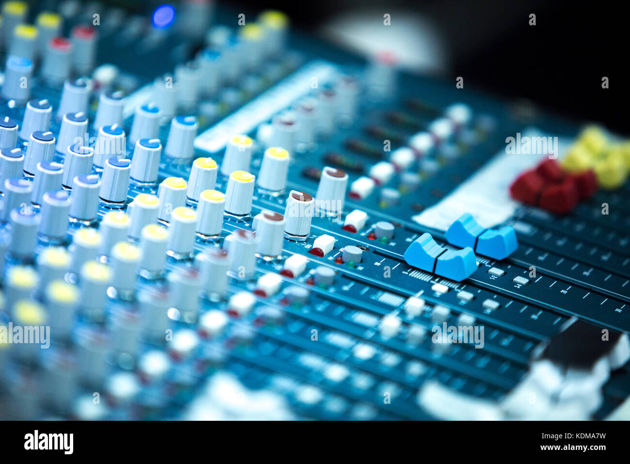 Deejay live electronic dj music mixing desk with buttons and controls ...