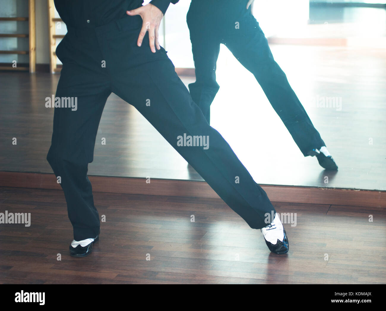 Ballroom dance male dancer and teacher in studio school dancing in ...