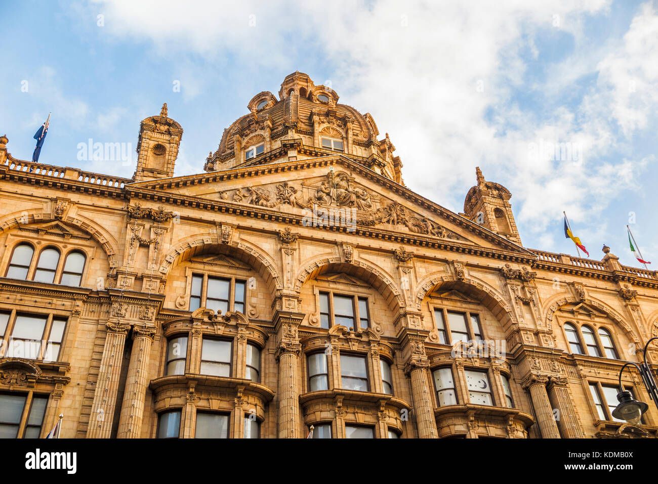 Facade detail and motto 'Omnia Omnibus Ubique' at Harrods, luxury ...