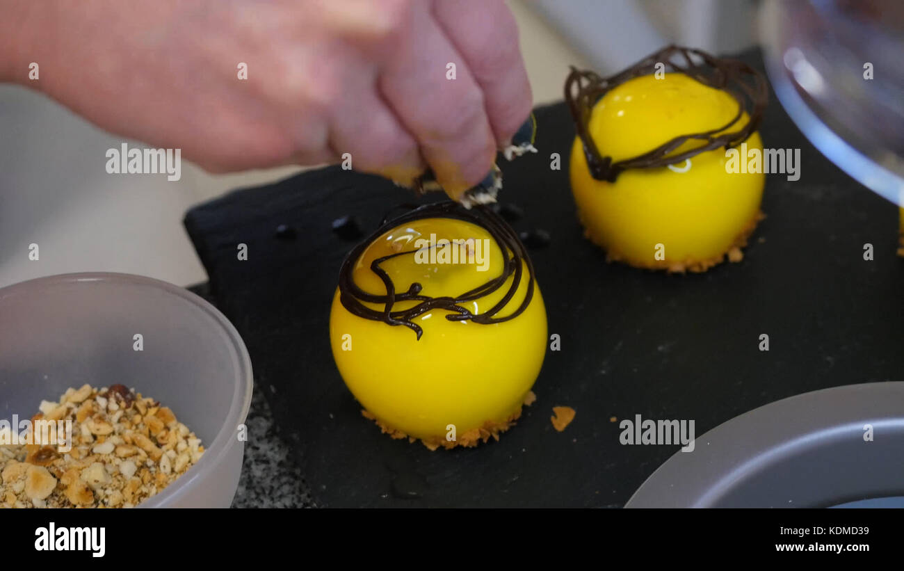 Preparation handmade chocolate candies, close up. confectionery factory ...