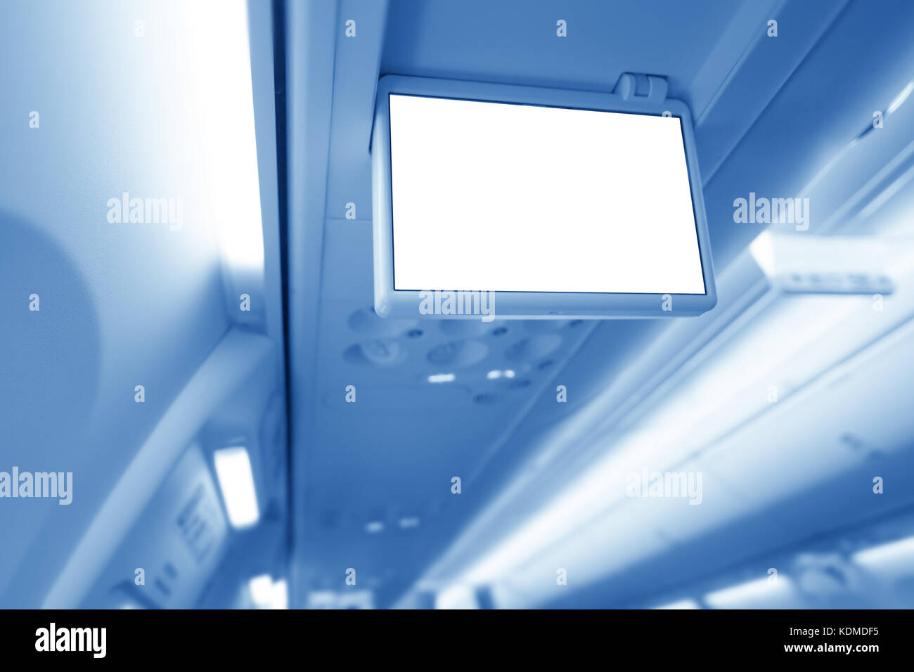Close-up of an airplane passenger`s hand pressing a button to call a ...
