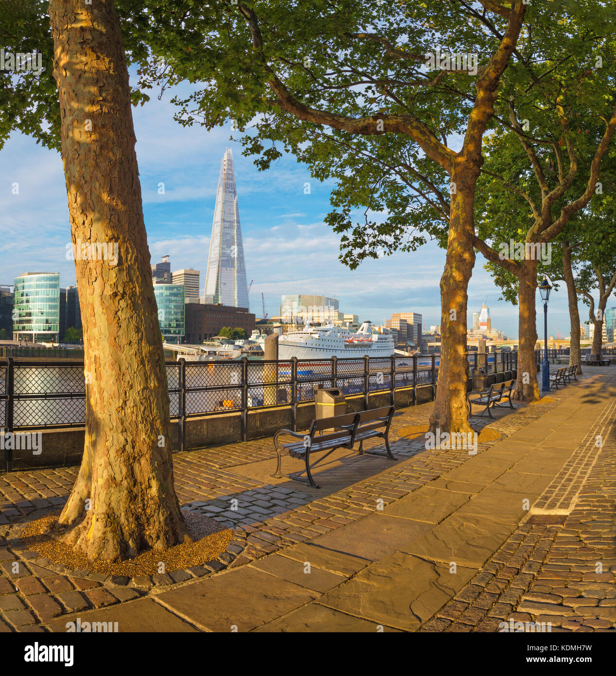 London - The Thames riverside and Shard from promenade in morning light ...