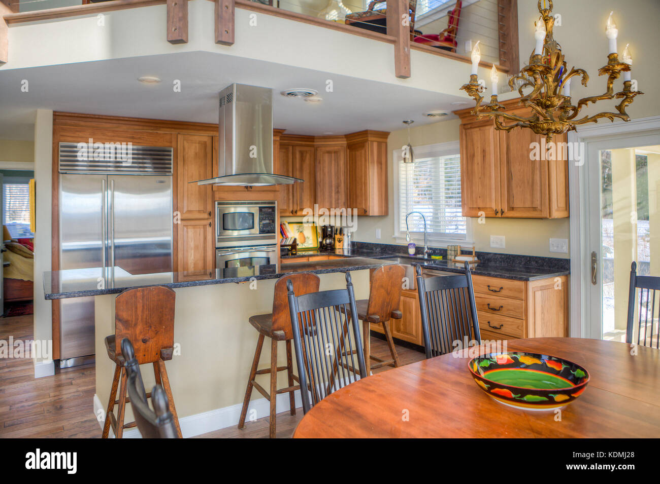 Stainless steel appliances in a modern, upscale kitchen in Vermont, USA ...