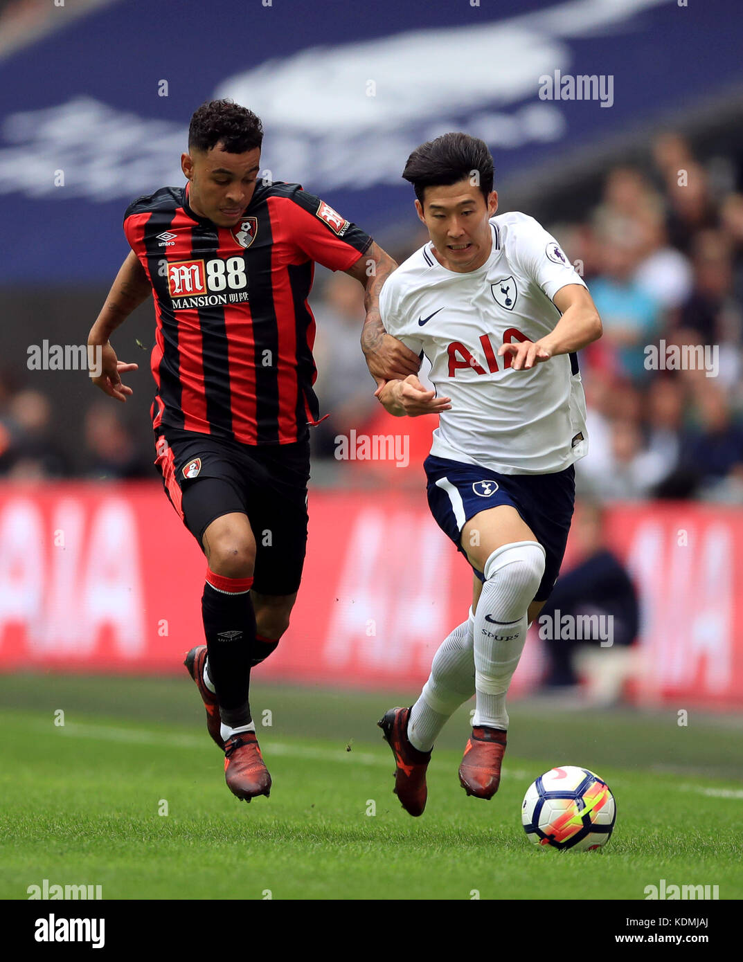 AFC Bournemouth's Joshua King (left) and Tottenham Hotspur's Son Heung ...