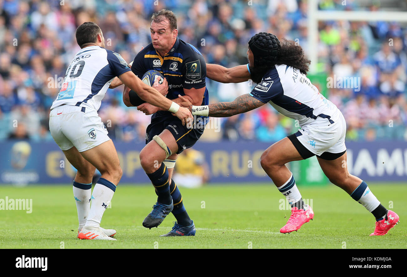 Leinster's Rhys Ruddock and Montpellier's Thomas Darmon (left) and ...