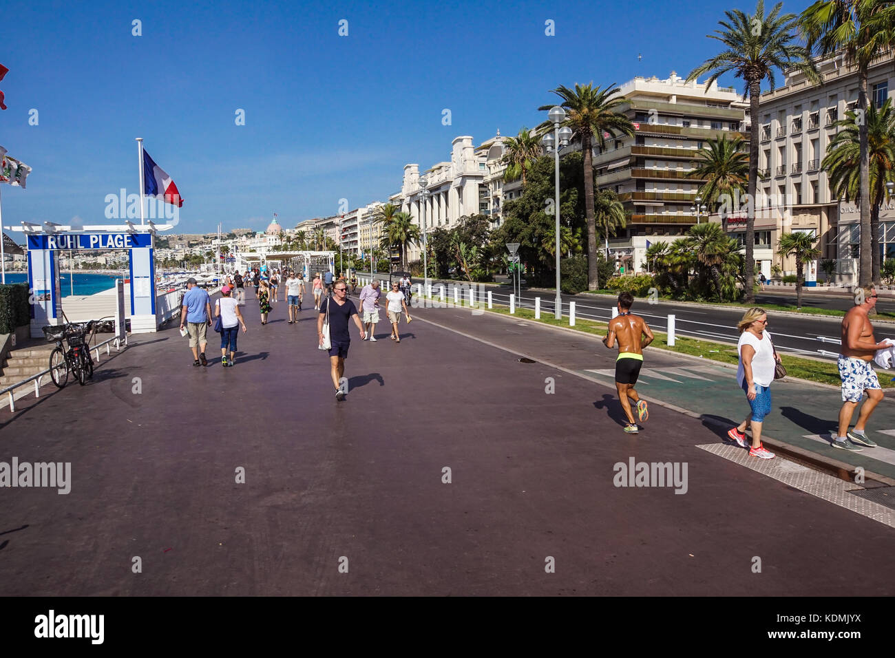 NICE, FRANCE - july 14, 2017: Tourists and local people walking on the ...
