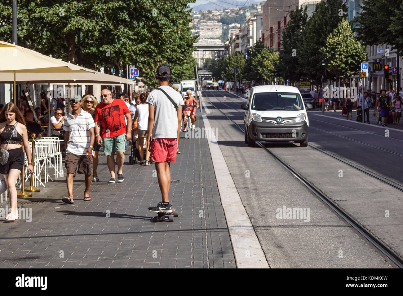 NICE, FRANCE - july 14, 2017: Tourists and local people walking on the ...