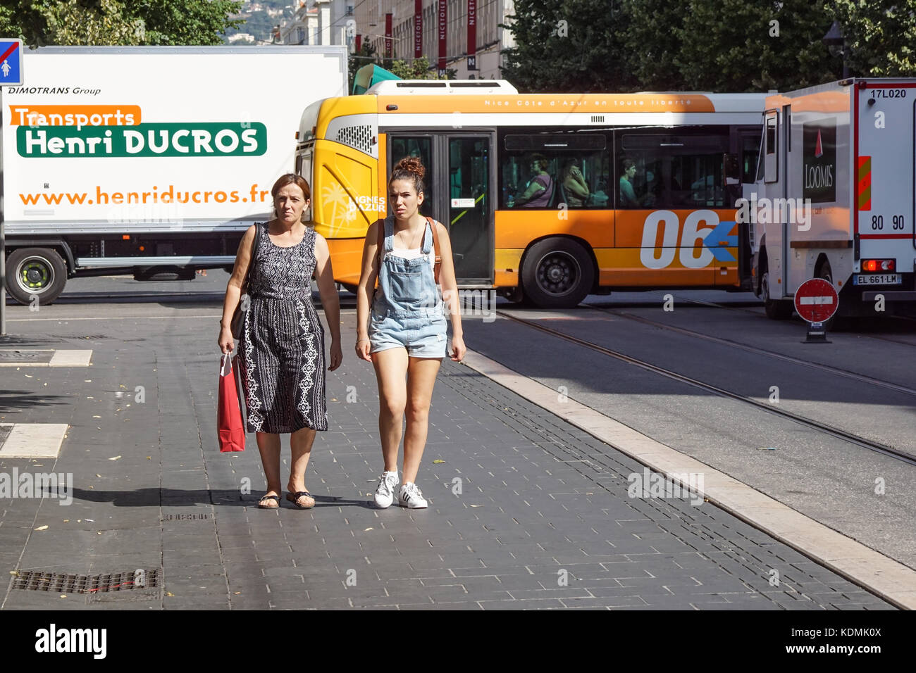 NICE, FRANCE - july 14, 2017: Tourists and local people walking on the ...