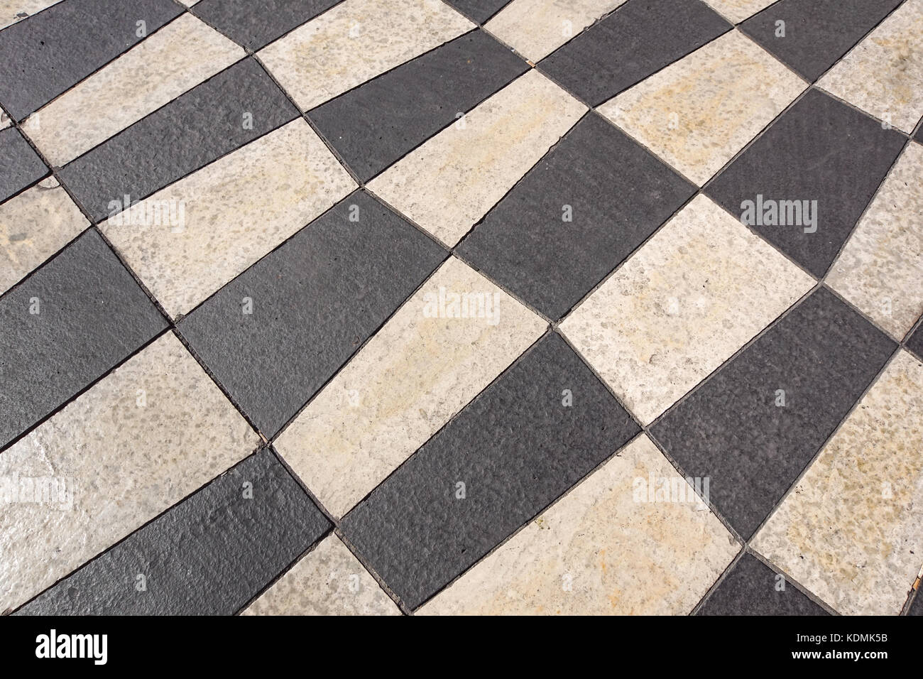 Outdoor street tiles with geometric pattern.The texture of perspective ...
