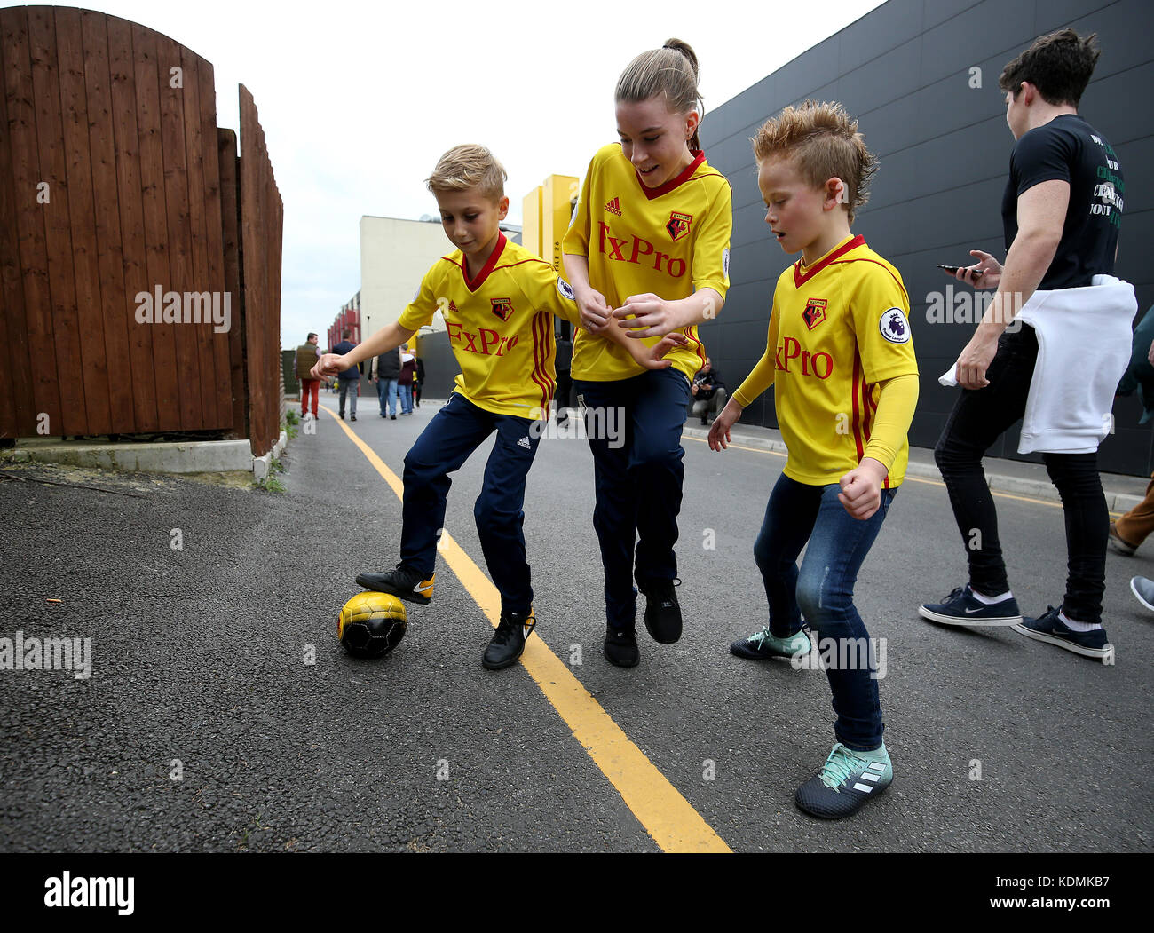 Young Watford fans play football outside the ground before the Premier ...