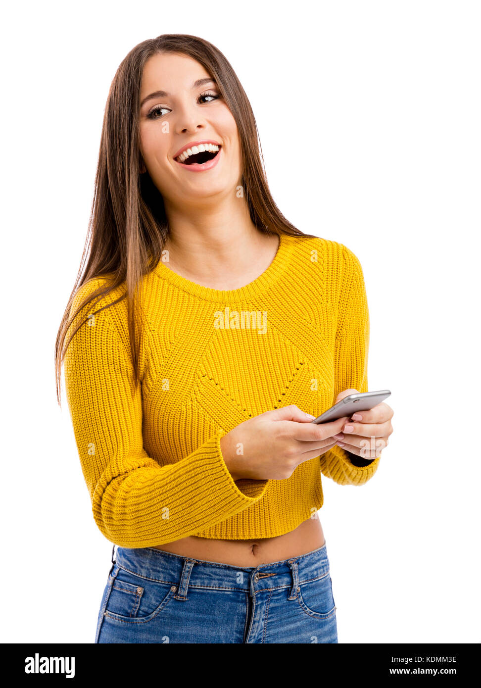 Beautiful girl sending a text message, isolated over white background ...
