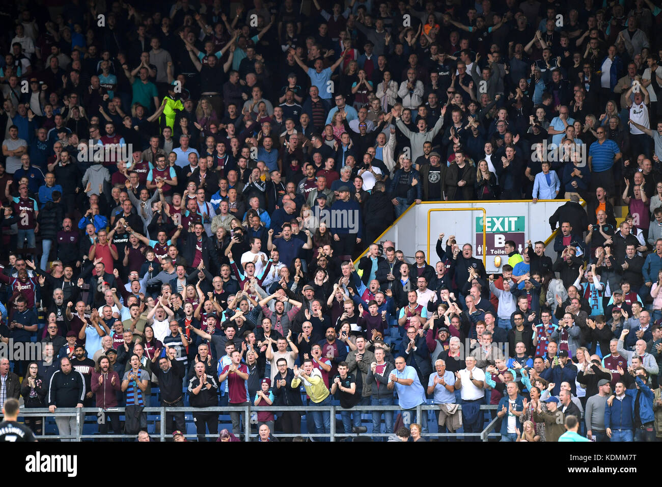 Burnley fans in the stands Stock Photo - Alamy