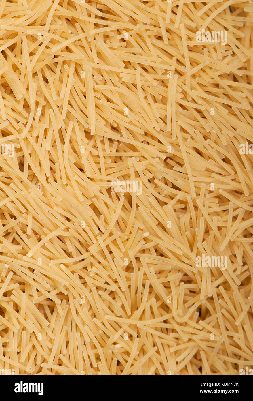 Raw vermicelli pasta texture background Stock Photo - Alamy