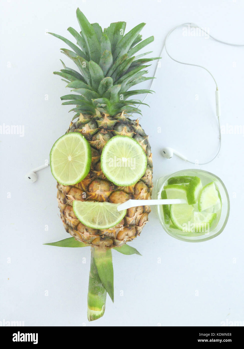 pineapple with mouth and eye made from lime Stock Photo - Alamy