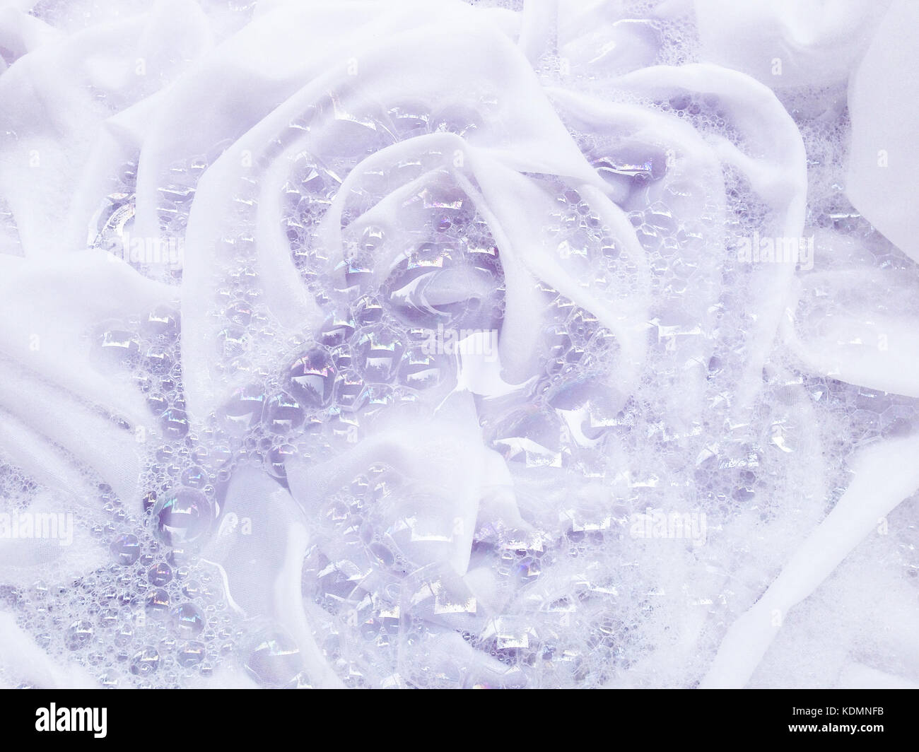 Soak a cloth before washing, white cloth Stock Photo - Alamy