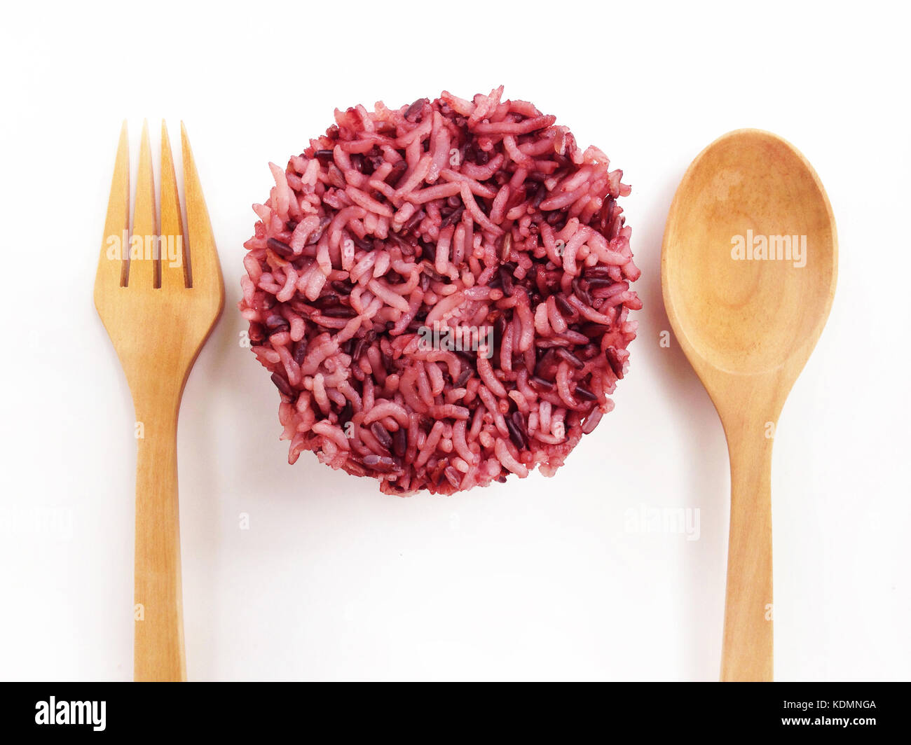 Thai white rice and rice berry mixed with spoon and fork on white ...