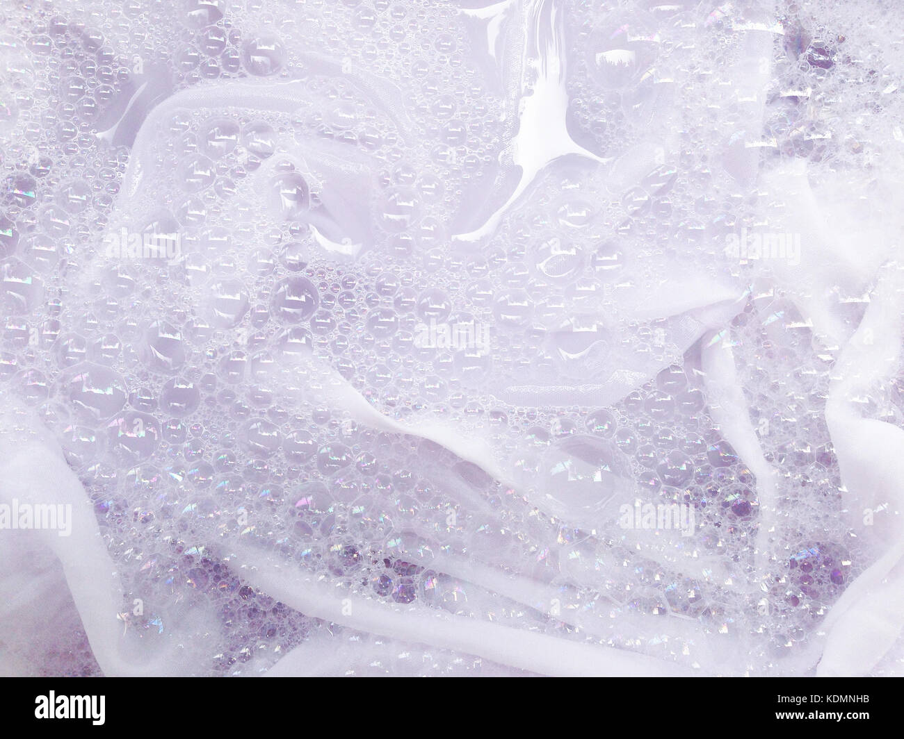 Soak a cloth before washing, white cloth Stock Photo - Alamy