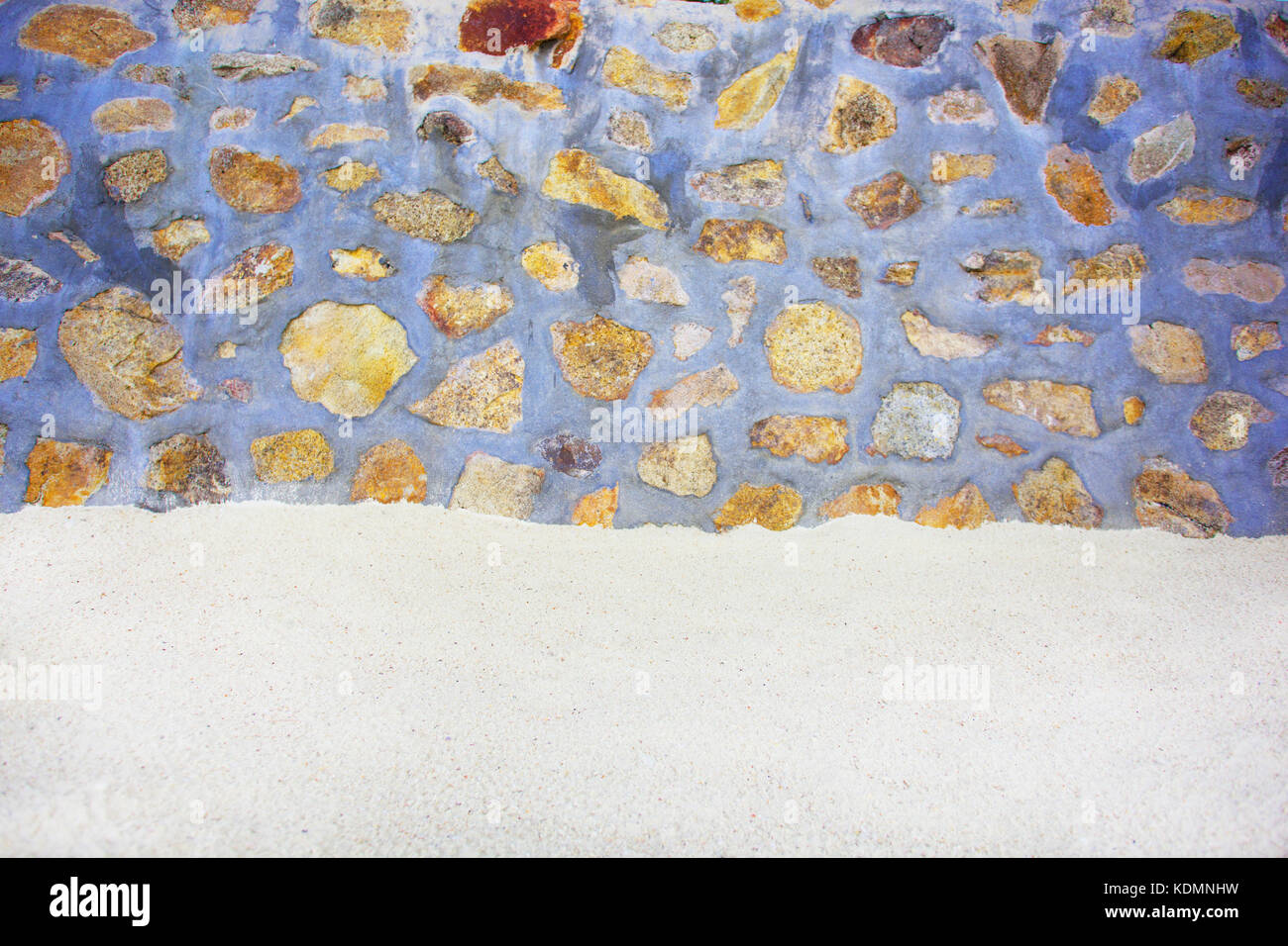 Sand with stones in cement Wall Stock Photo - Alamy