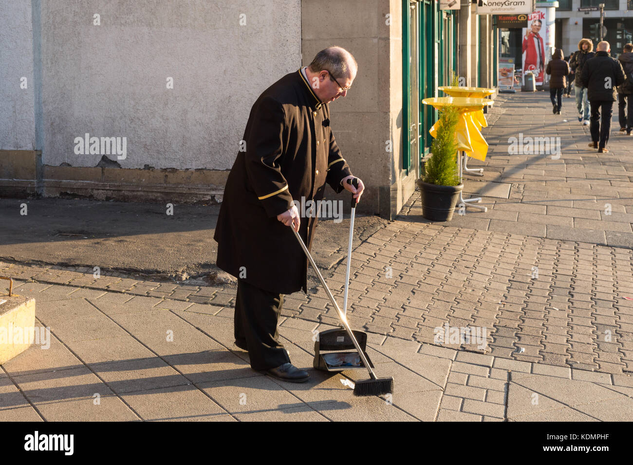 Employee sweeping street hi-res stock photography and images - Alamy