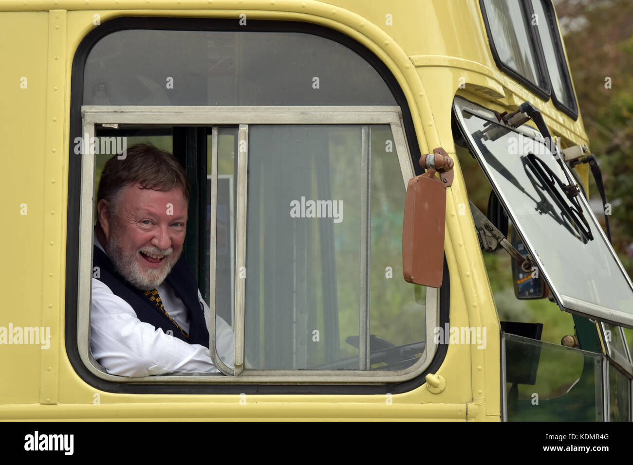 a vintage or collectors bus with the driver in the cab at a busses and ...