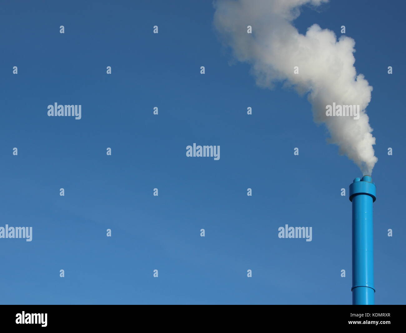 Blue Industrial Chimney on Sky Background with White Smoke Stock Photo ...