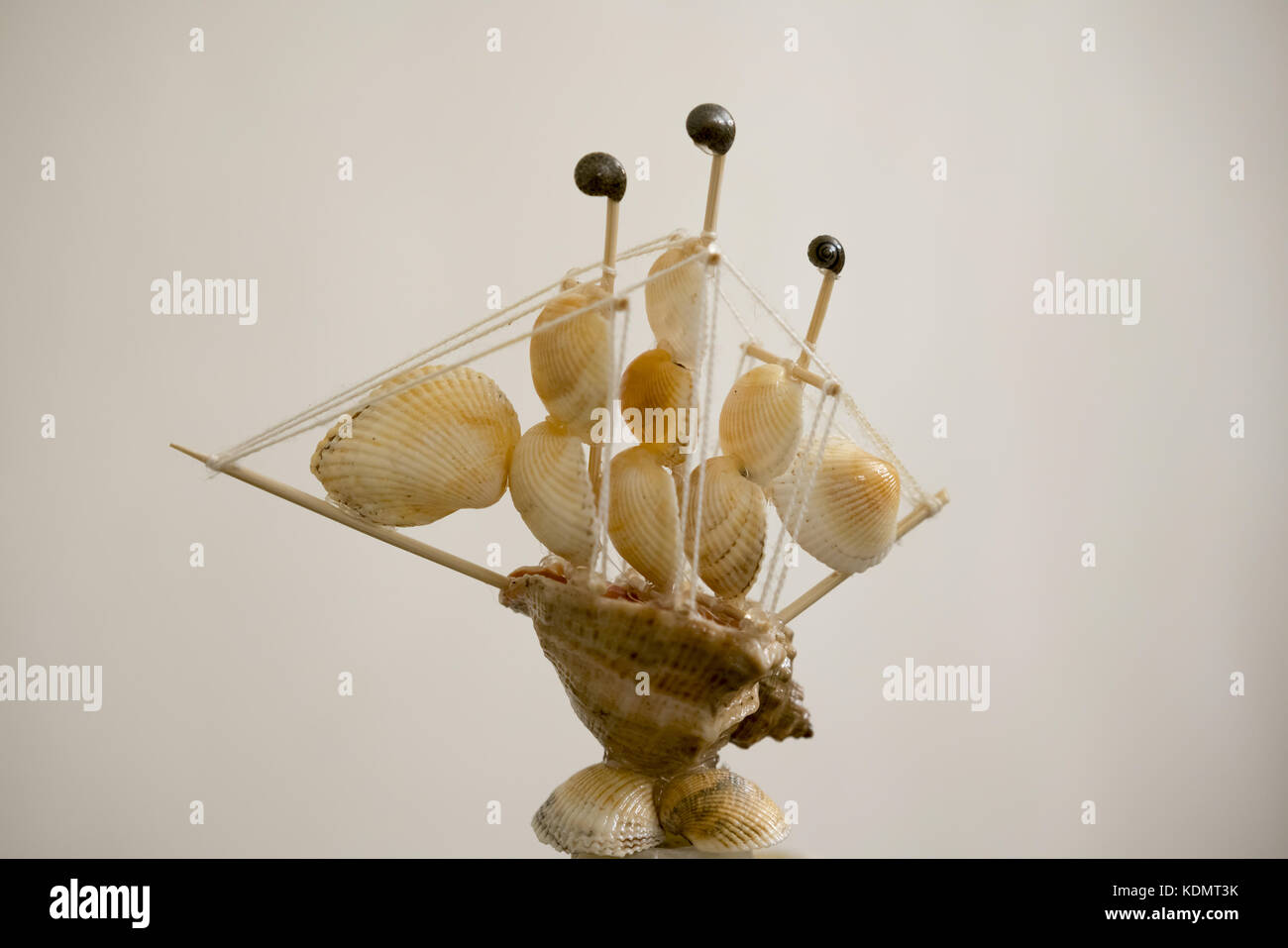 decorative ship of seashells on a light background Stock Photo - Alamy