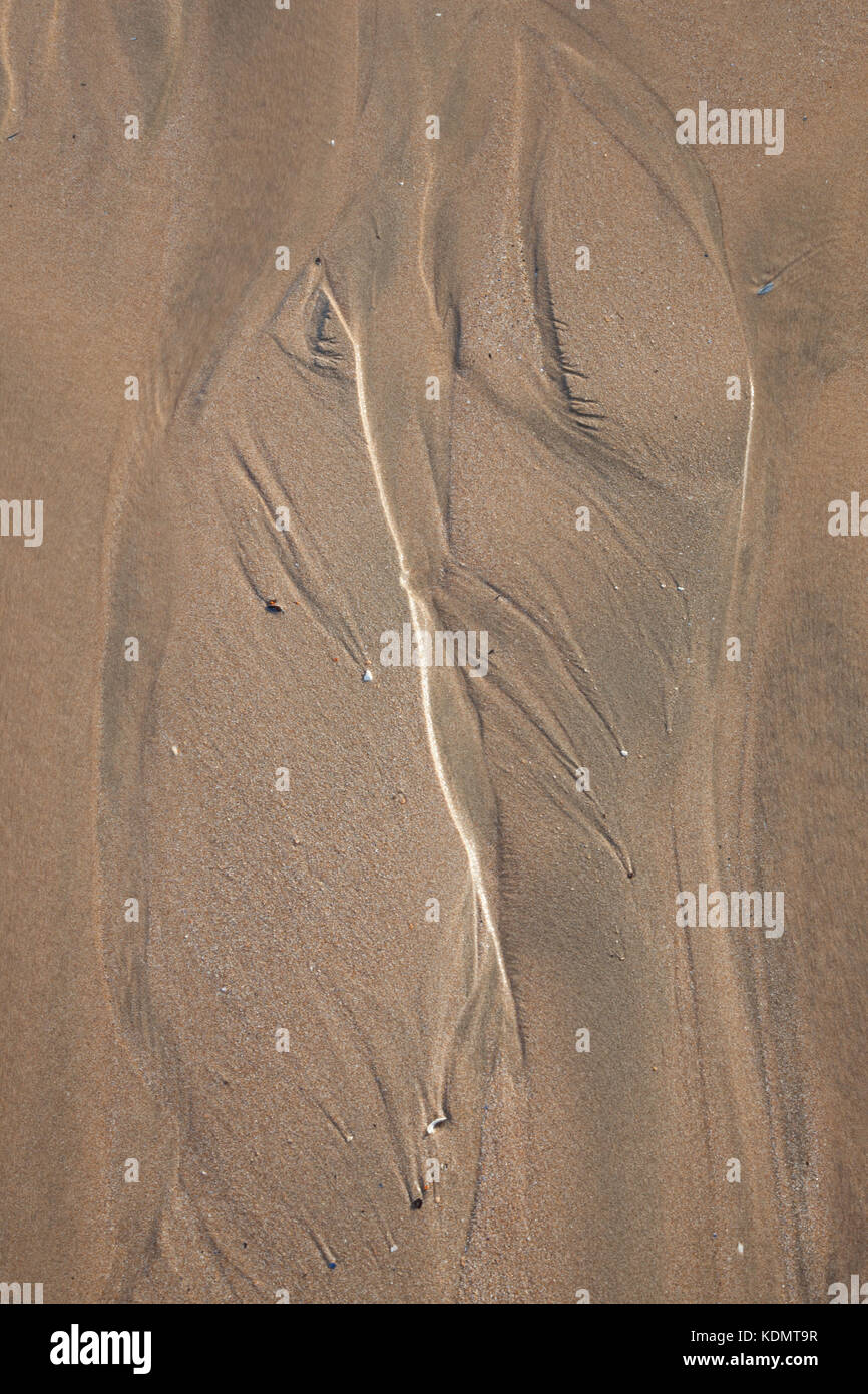 Sand patterns left by the tide Stock Photo - Alamy