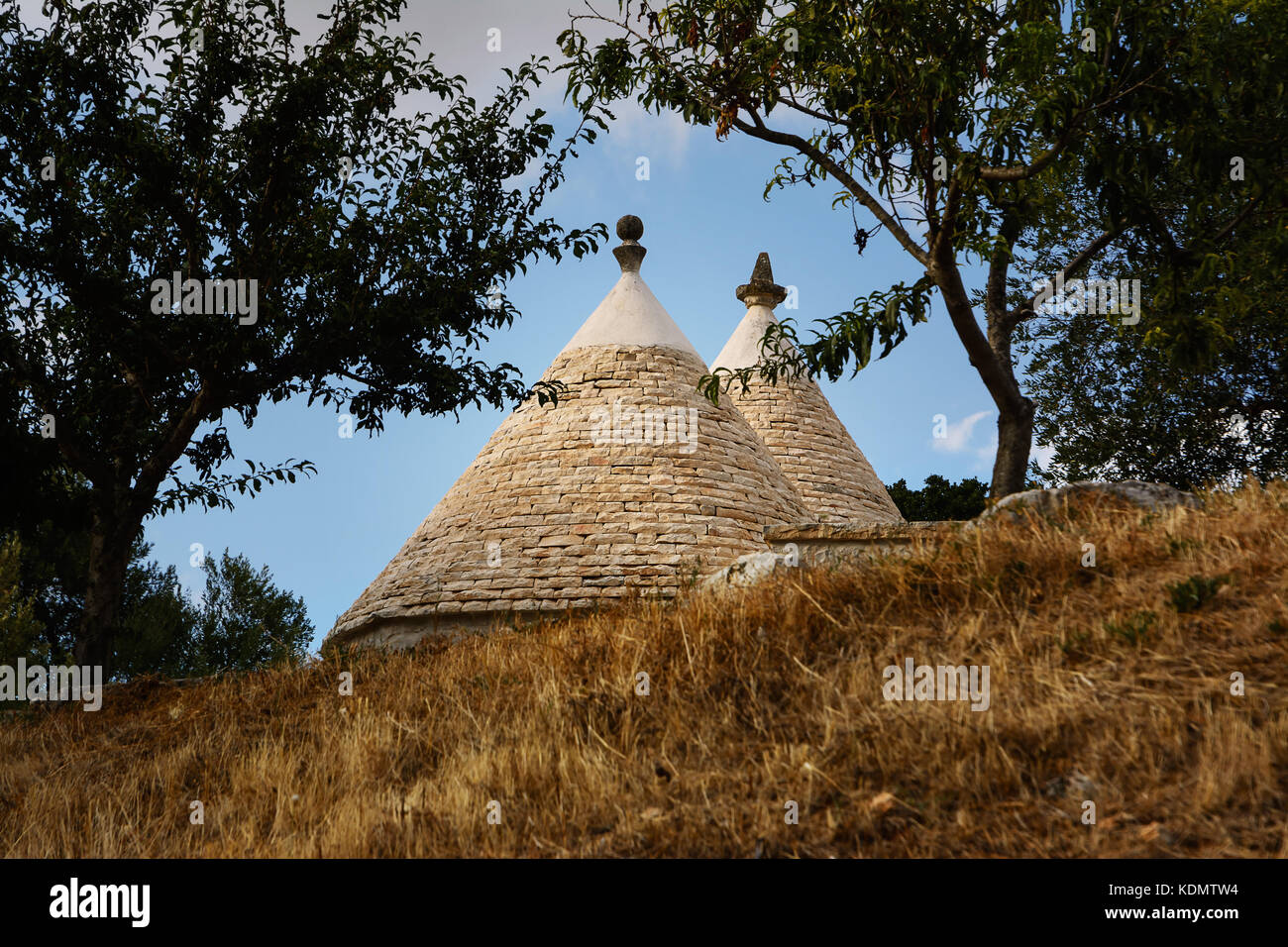 Trulli roofs in the countryside Stock Photo - Alamy