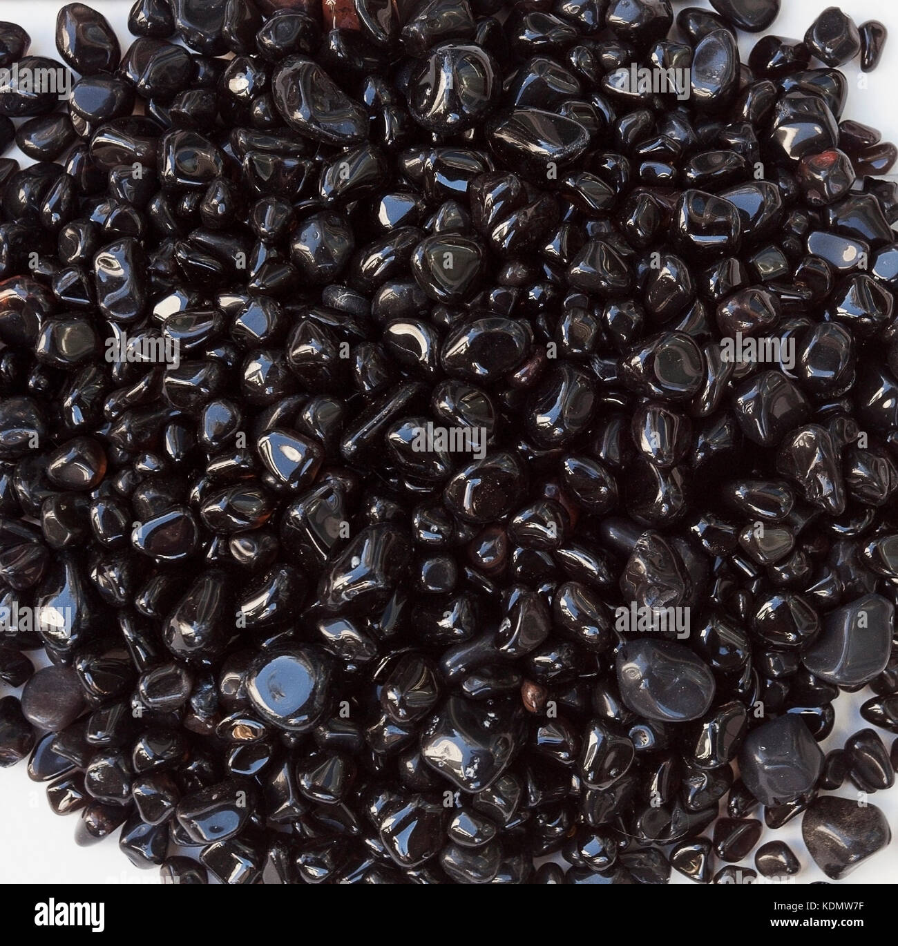 Polished volcanic obsidian stones also known as Apache tears Stock ...