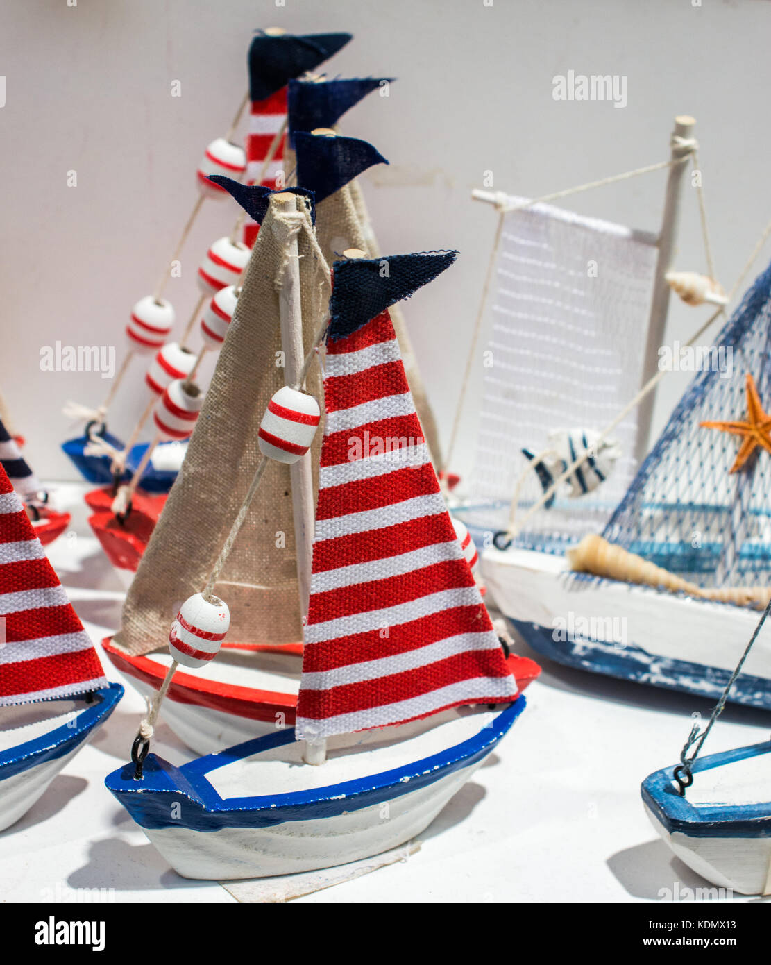 Set of small colorful model boats Stock Photo - Alamy