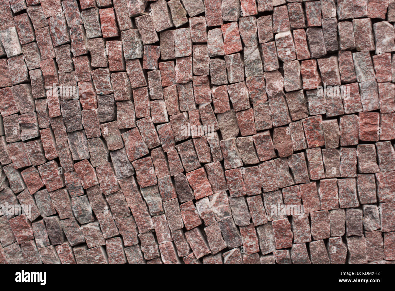 Decorative cubic stone wall as background texture Stock Photo - Alamy