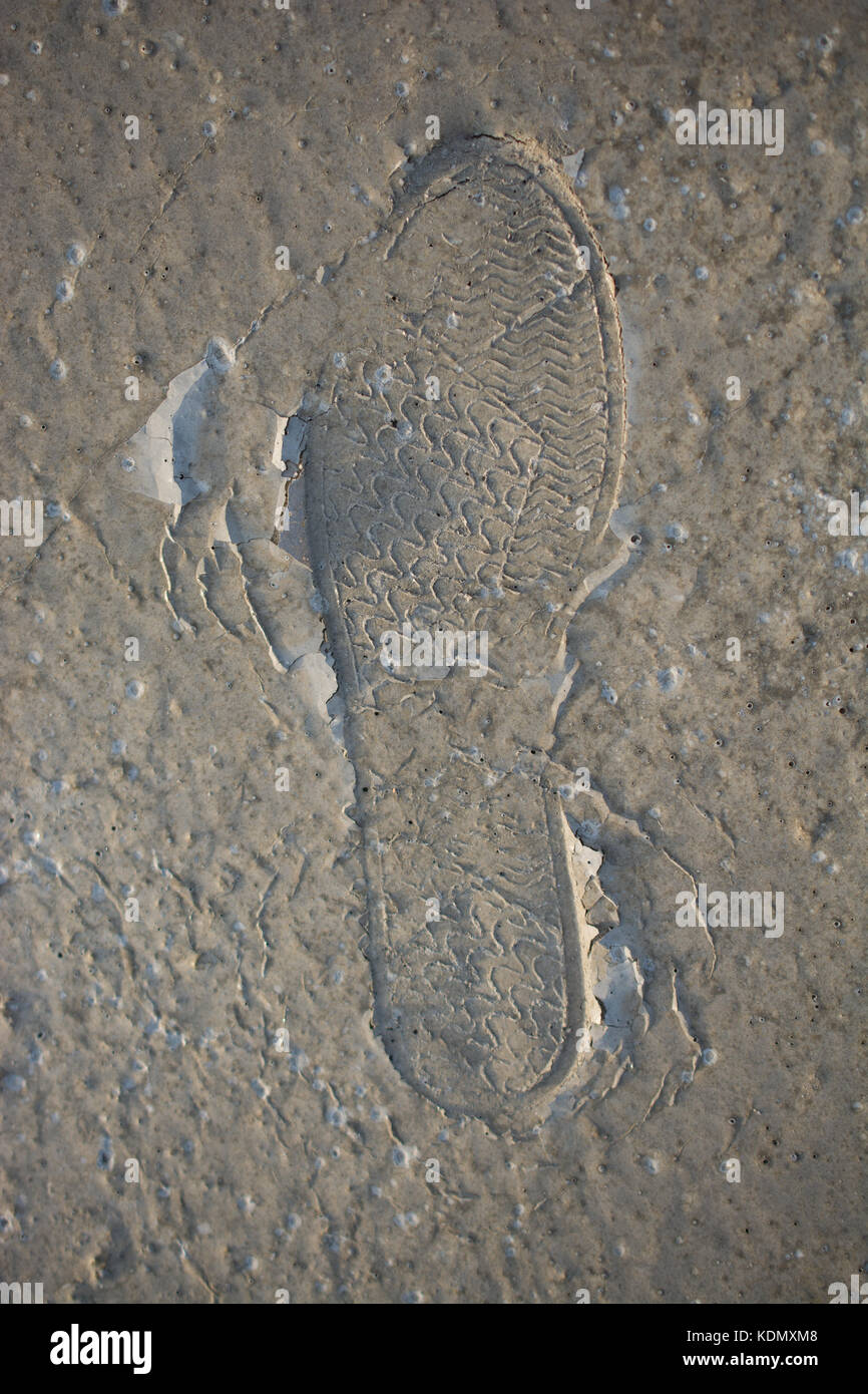 Footstep pattern seen on a concrete background Stock Photo - Alamy