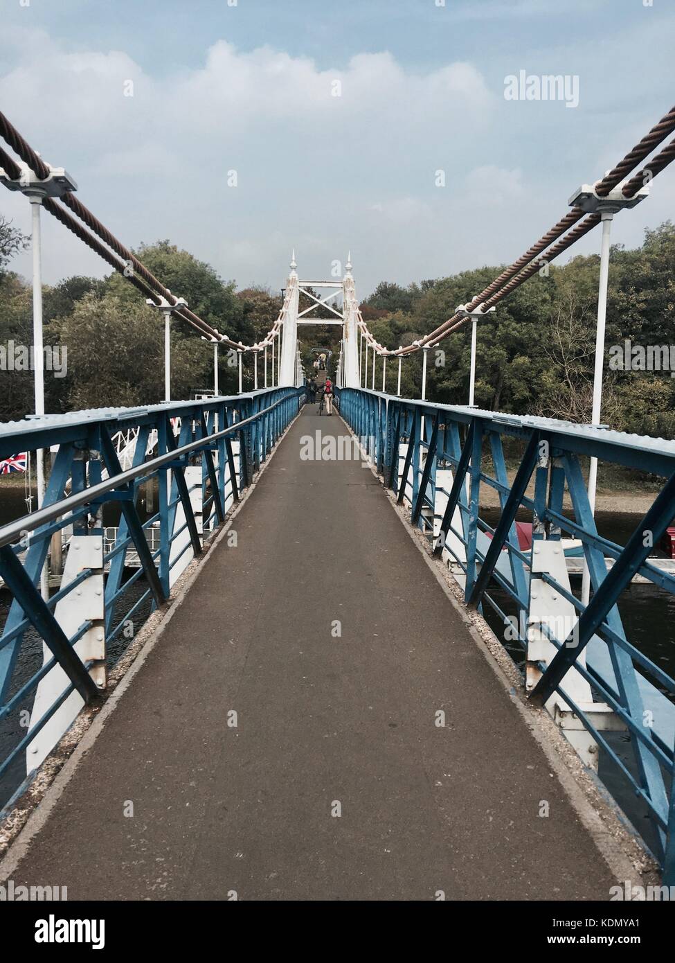 Nice big blue bridge on Richmond in London over the river with boats ...