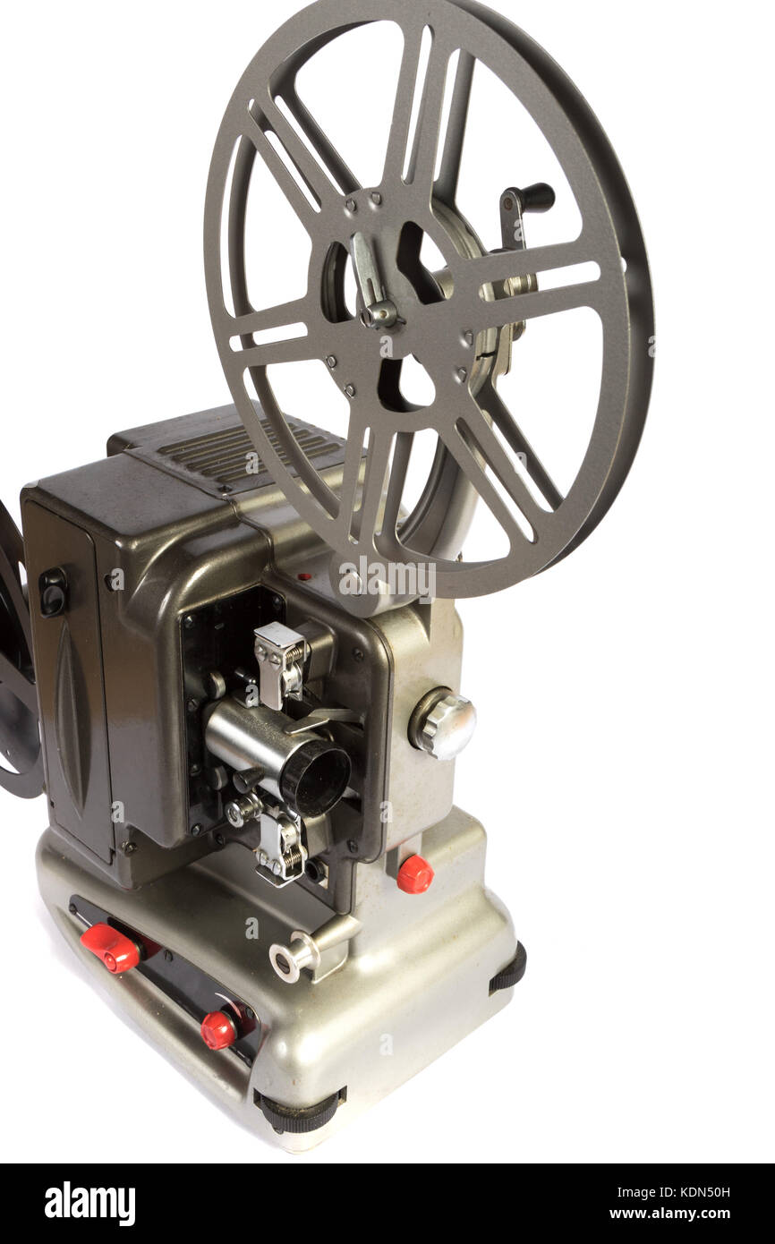 A retro home movie projector dirty from storage isolated on a white ...