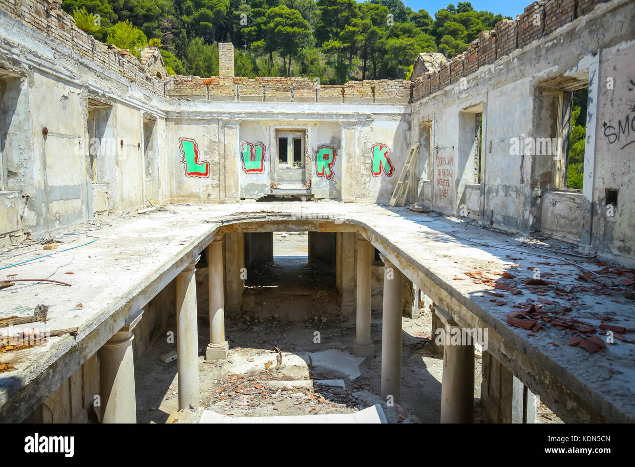 KUPARI, CROATIA - JULY 19, 2017 : The ruins of an old hotel Grand with ...