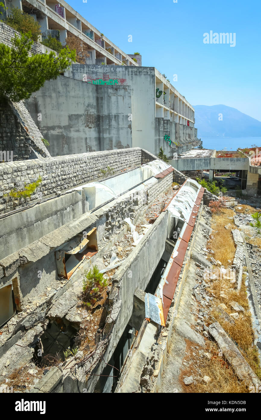KUPARI, CROATIA - JULY 19, 2017 : The exterior of an old ruined hotel ...