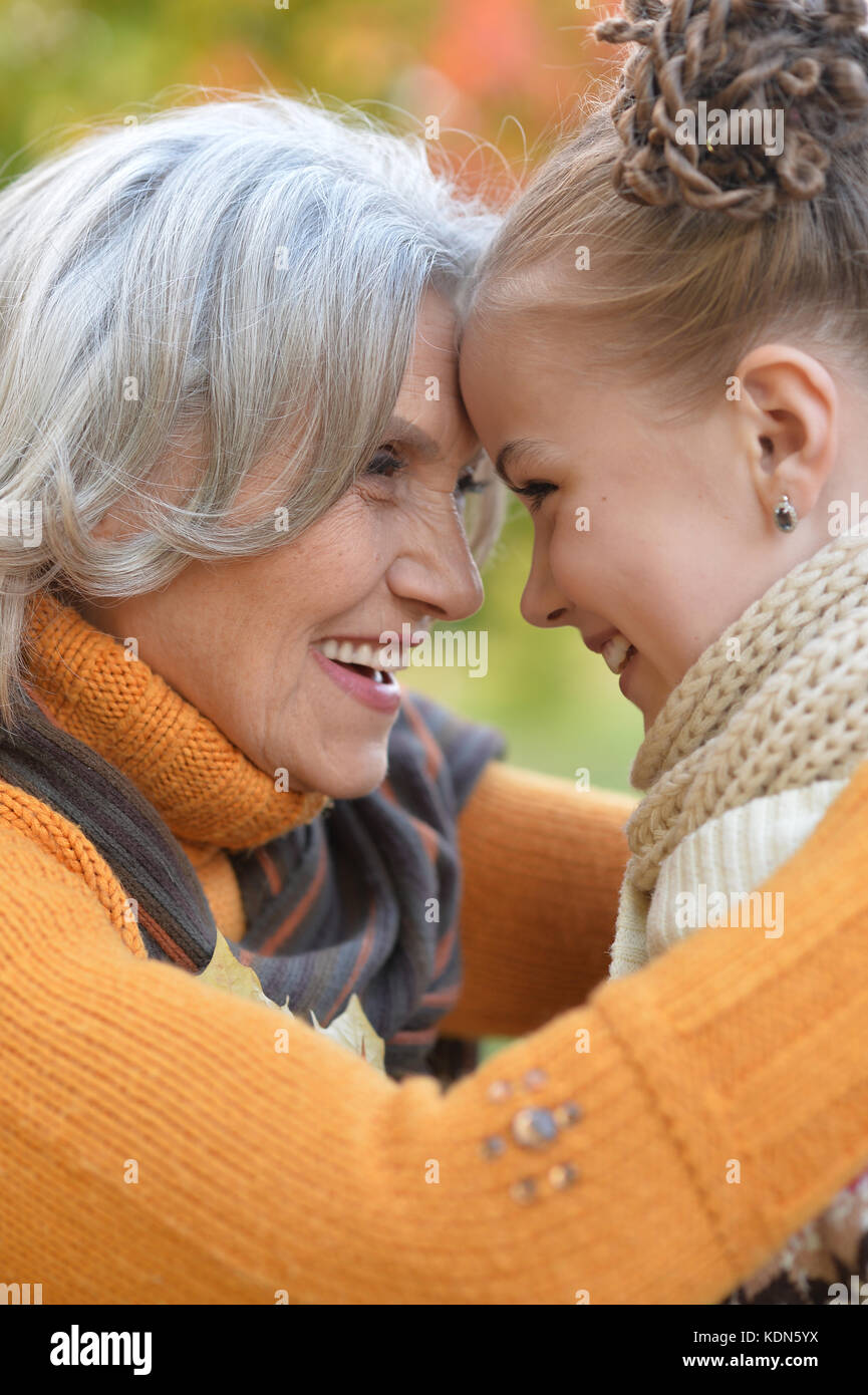 granny and granddaughter posing outdoors in autumn part Stock Photo - Alamy