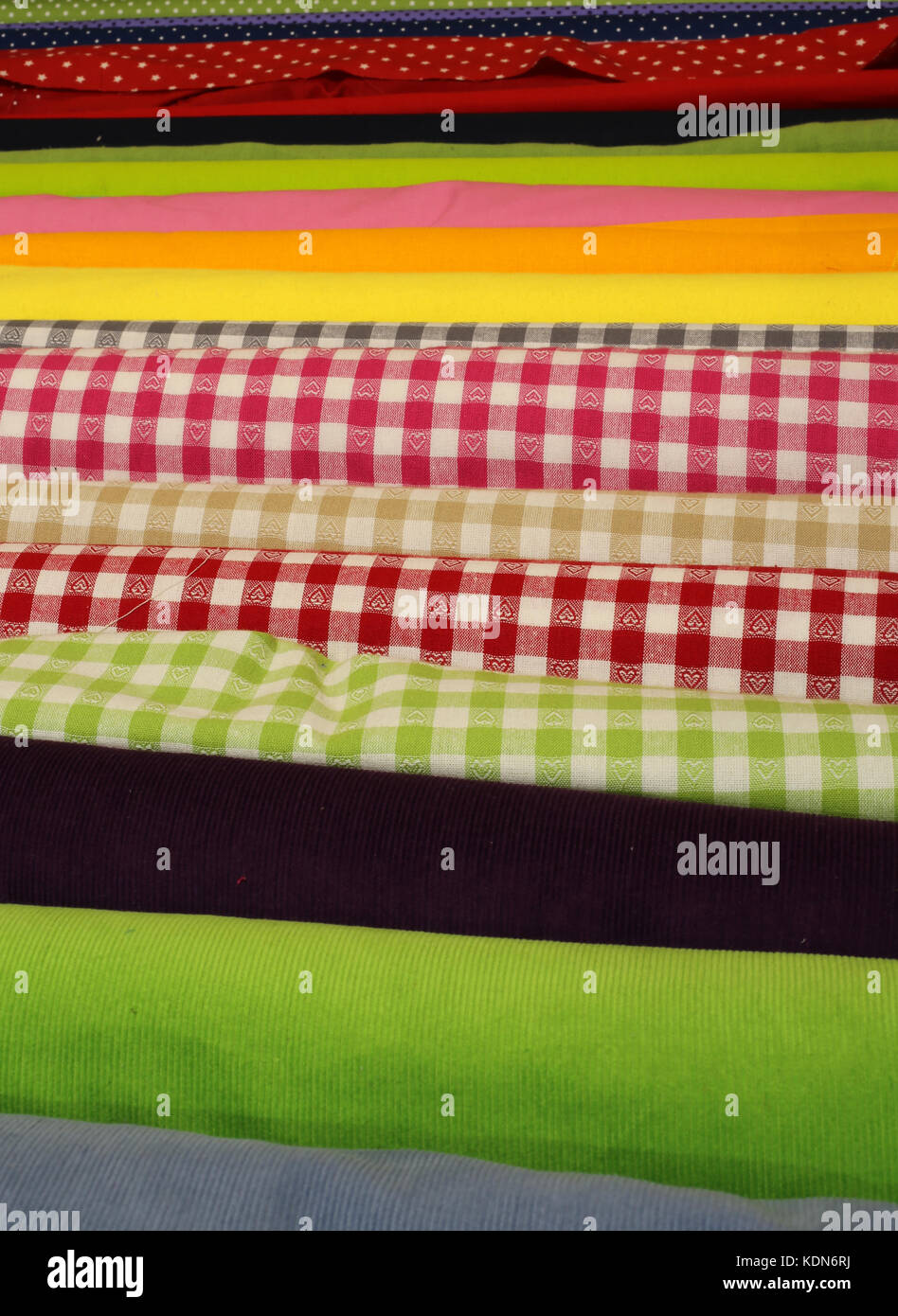 sale of fabrics of many varieties in the textiles and fabrics shop ...