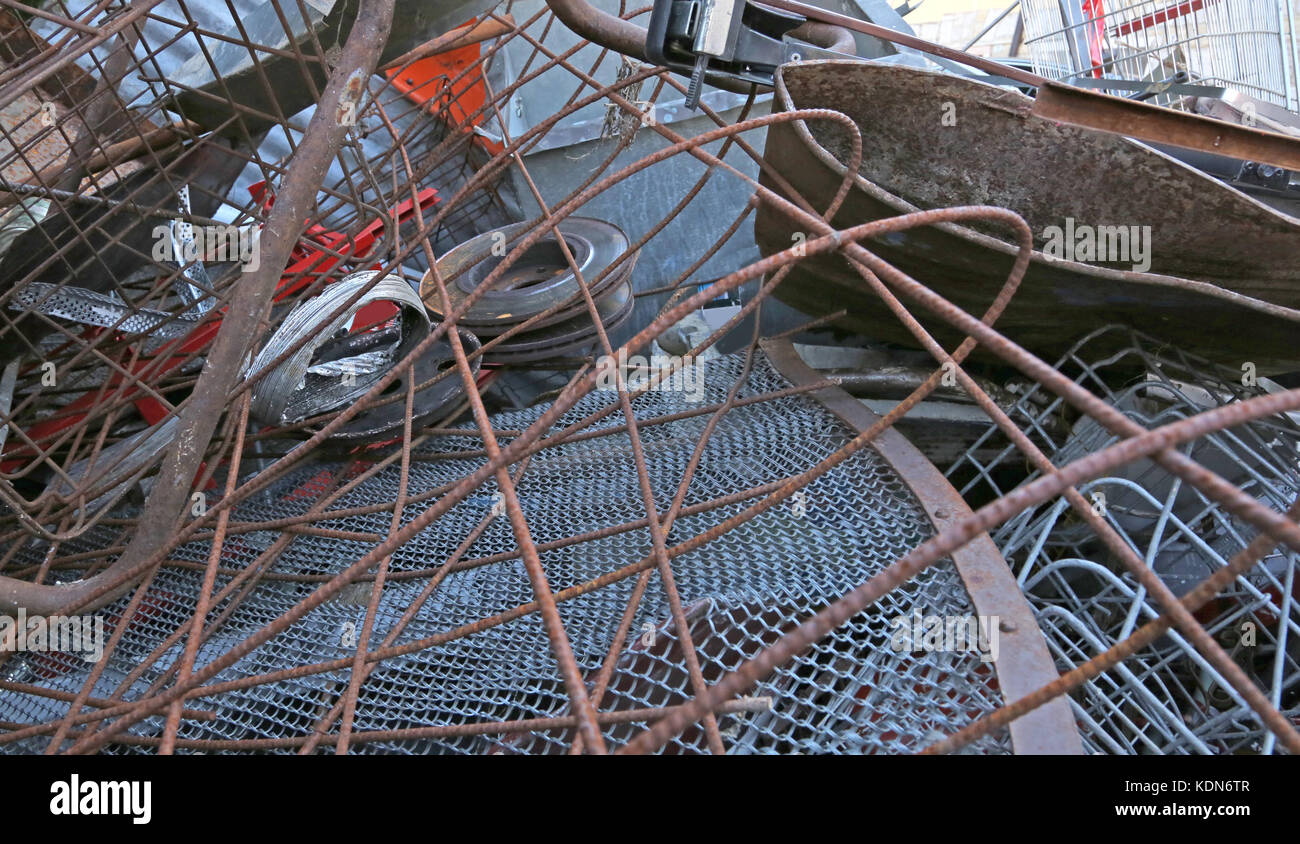 dump of iron material into the recyclable waste collection center with ...