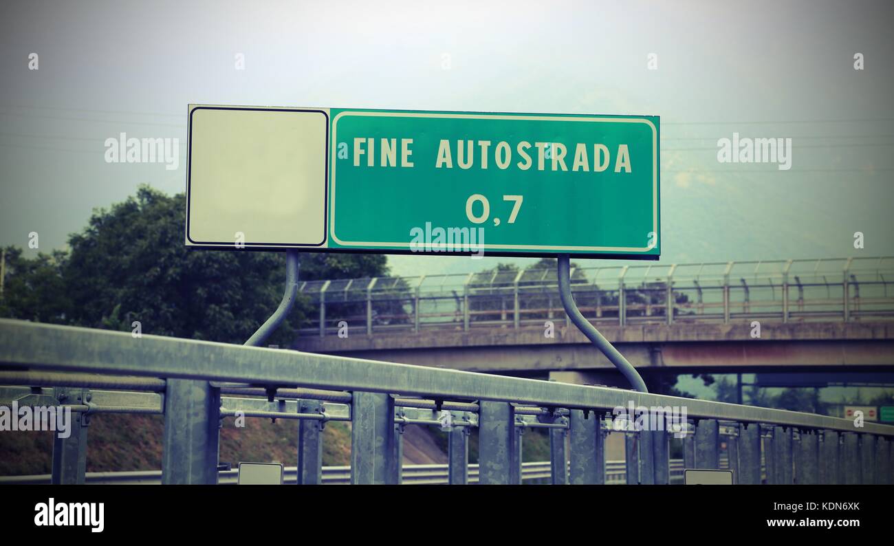 road sign indicating the end of the highway in italy FINE AUTOSTRADA ...