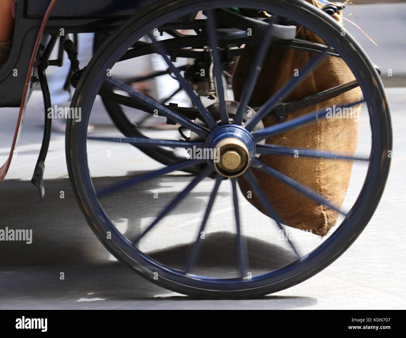 Wooden wheel of an ancient Carriage in moviment Stock Photo - Alamy